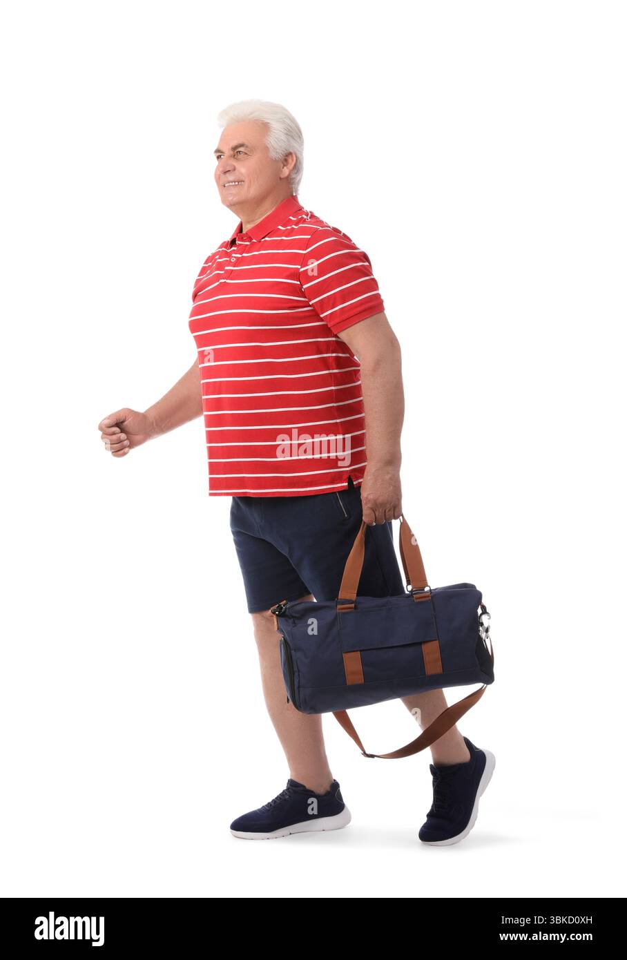 Active senior walking on Cut Out Stock Images & Pictures - Alamy