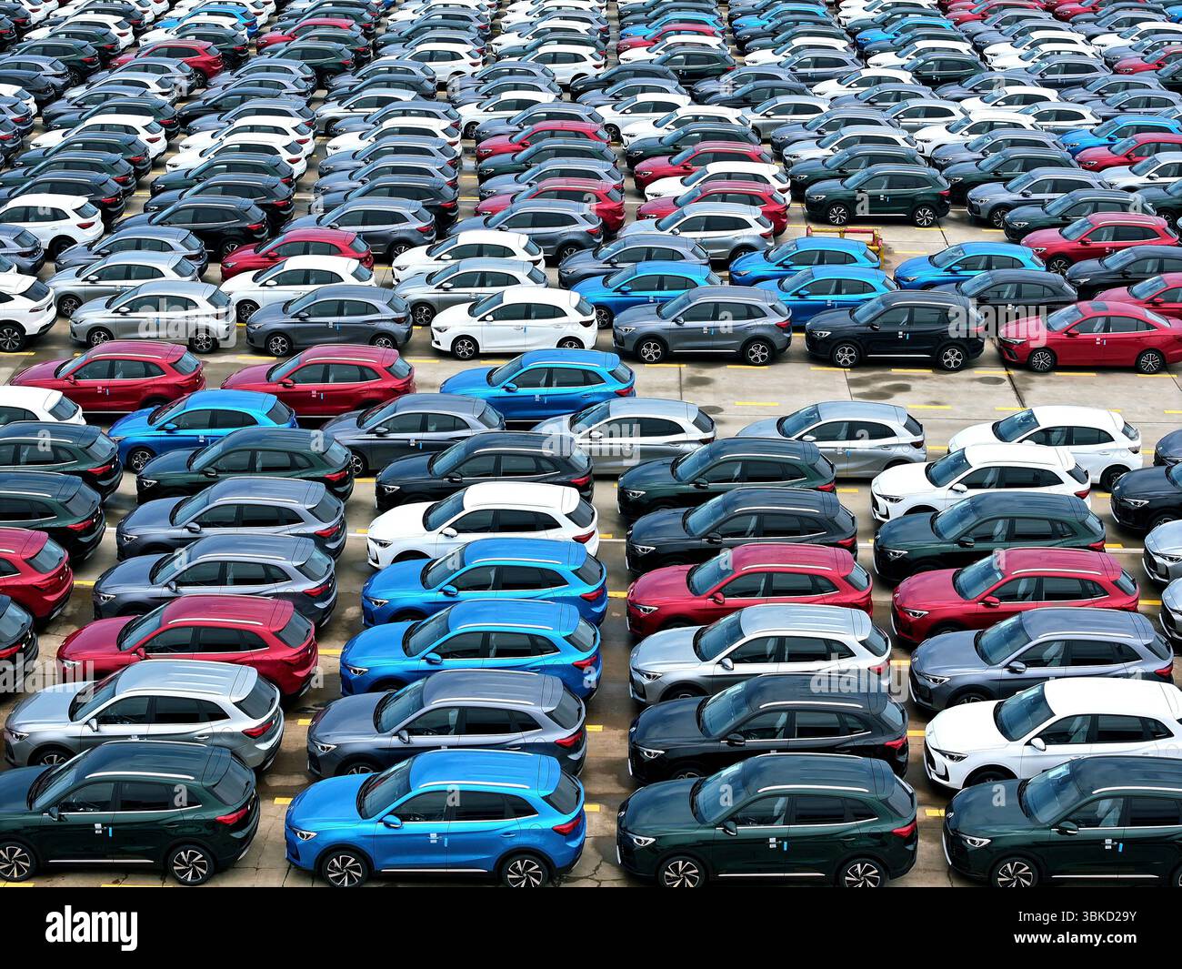 Aerial view of new cars waiting for shipment to overseas market in a ...