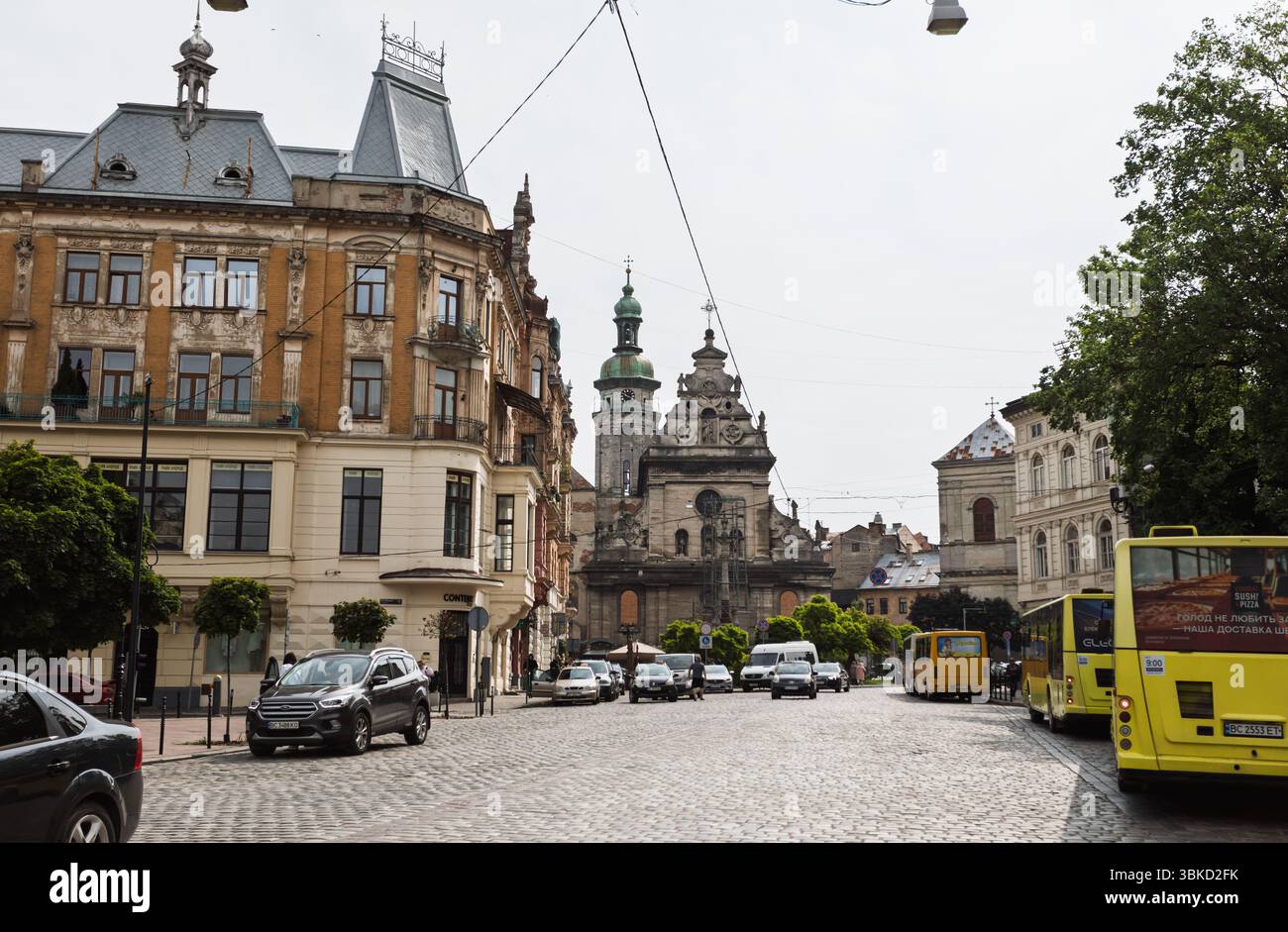 Historic architectural structures are seen lining a cobblestone street ...