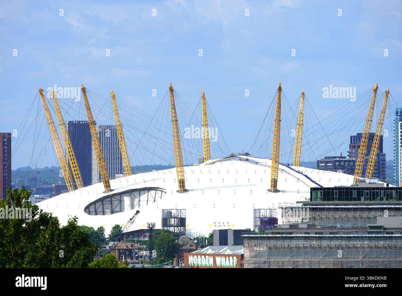 Iconic Landmark Dome with Yellow Spires Against City Skyline. Greenwich ...