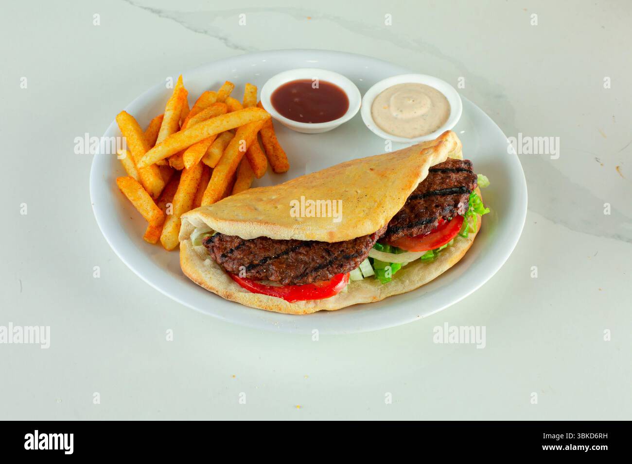 Arabic burger or taboon bread with burger beef slices Stock Photo - Alamy