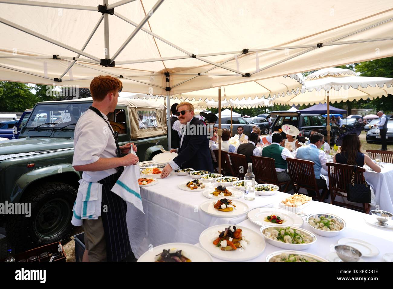 Food is prepared for 30 guests in the car park on day four of Royal ...