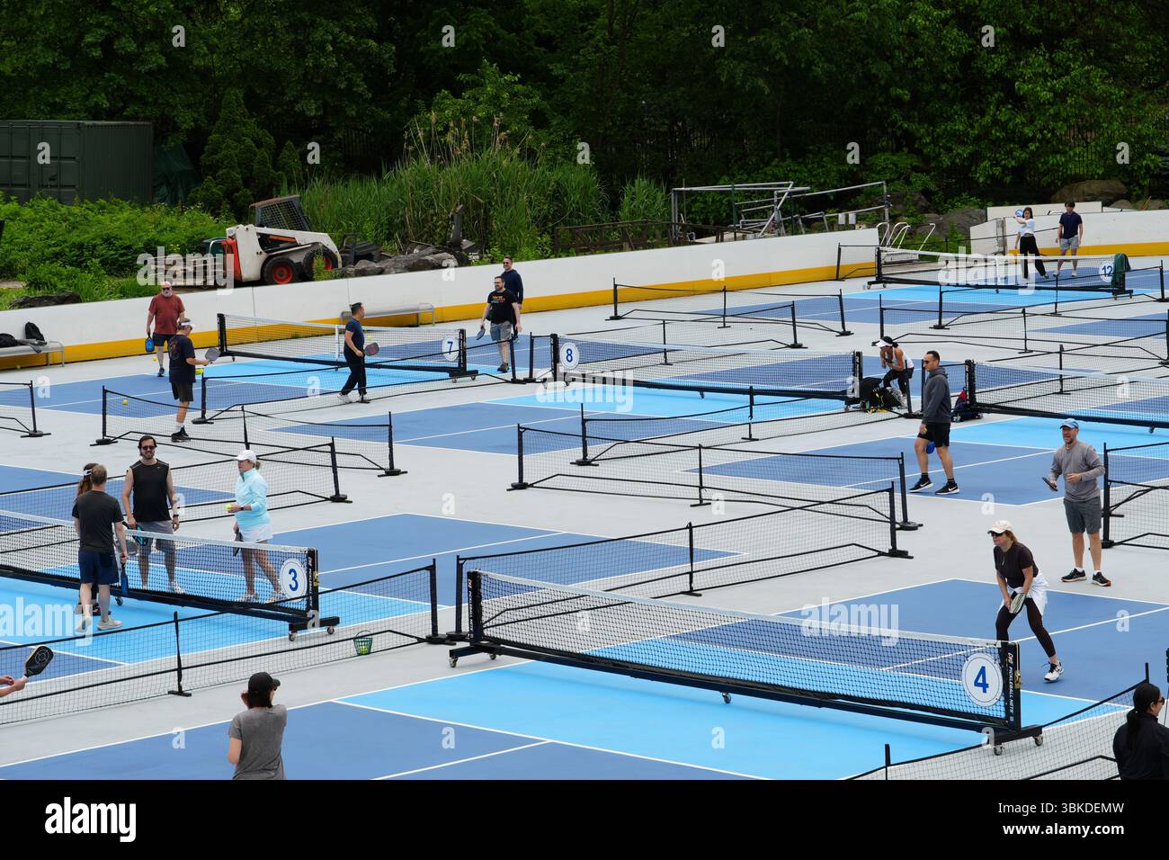 Pickleball players and courts, Wollman Rink, Central Park, New York ...
