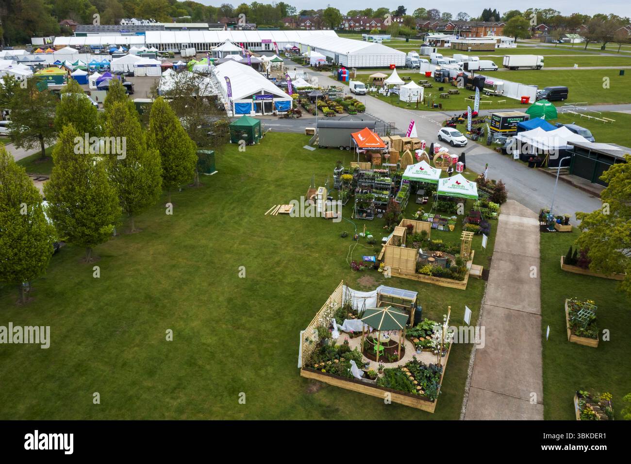 Aerial high view (from above) over show ground & outside displays ...