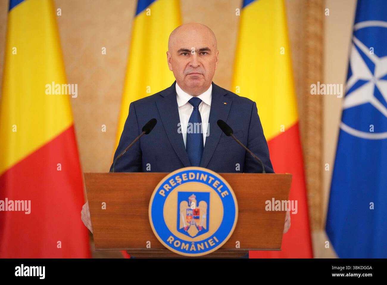 Ilie Bolojan, the President of the country's senate, speaks after ...