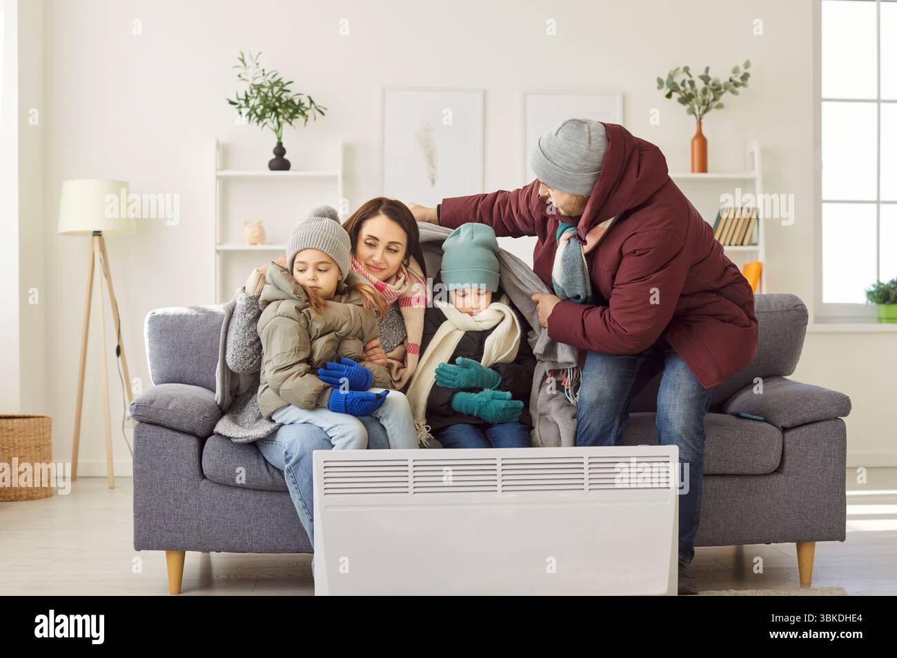 Family keeping warm at home hi-res stock photography and images - Alamy