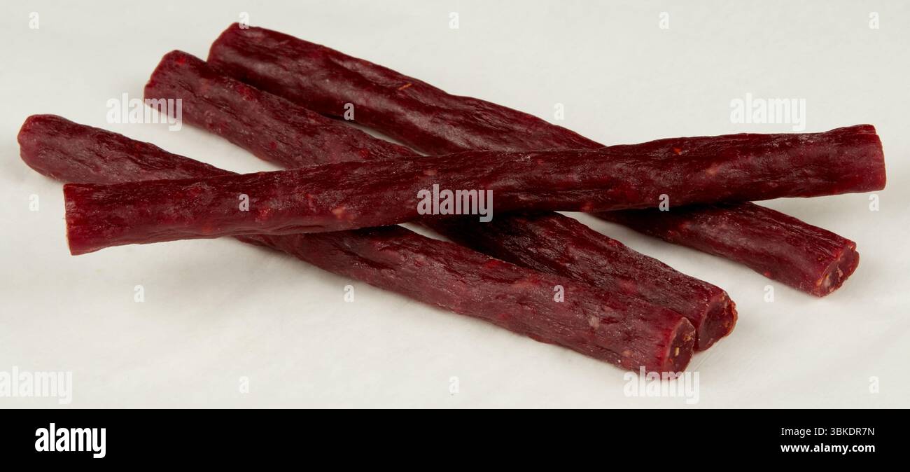 Dried beef sticks isolated nature background with clipping path Stock ...
