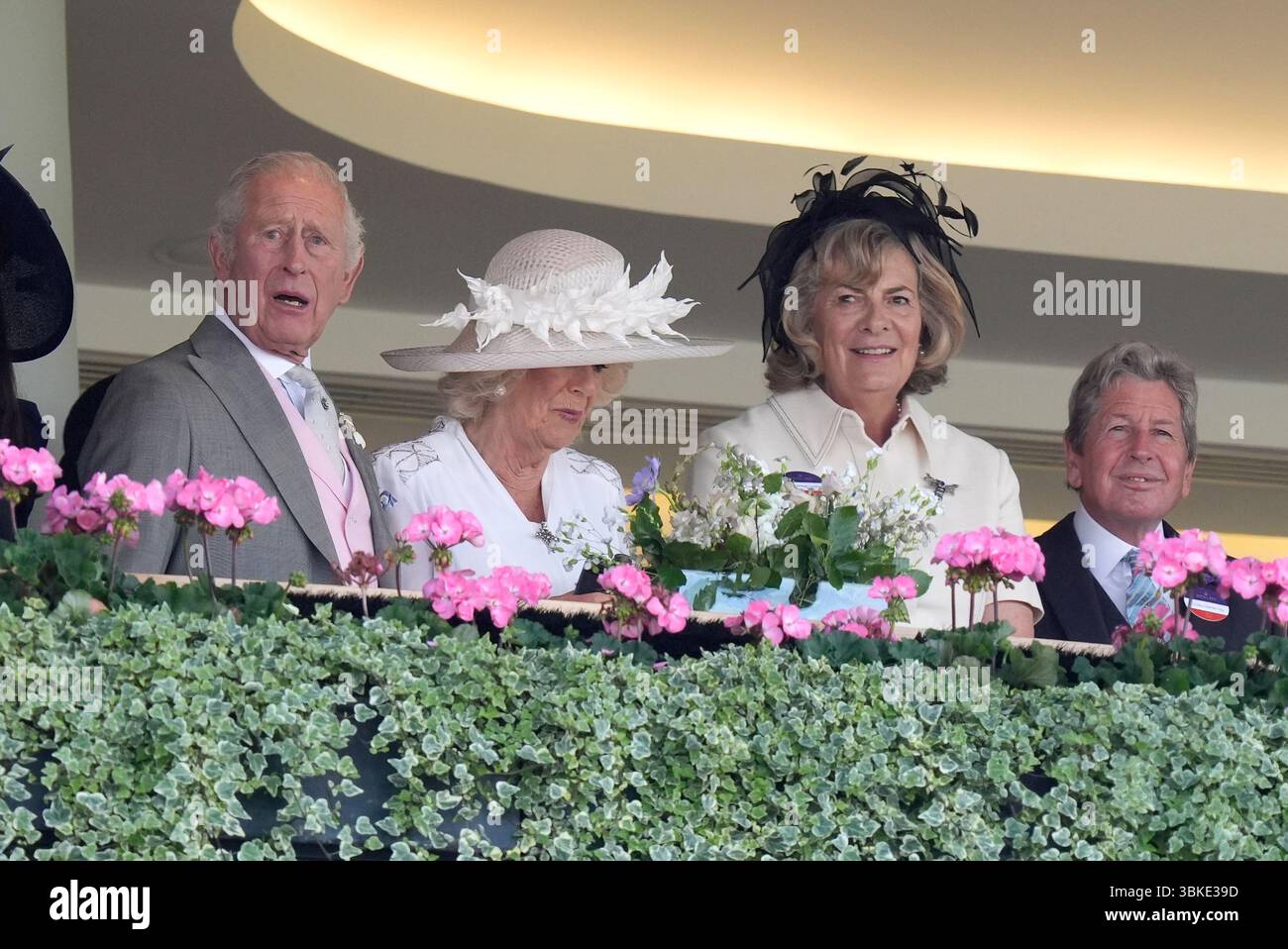 King Charles III and Queen Camilla watching the Sandringham Stakes with ...
