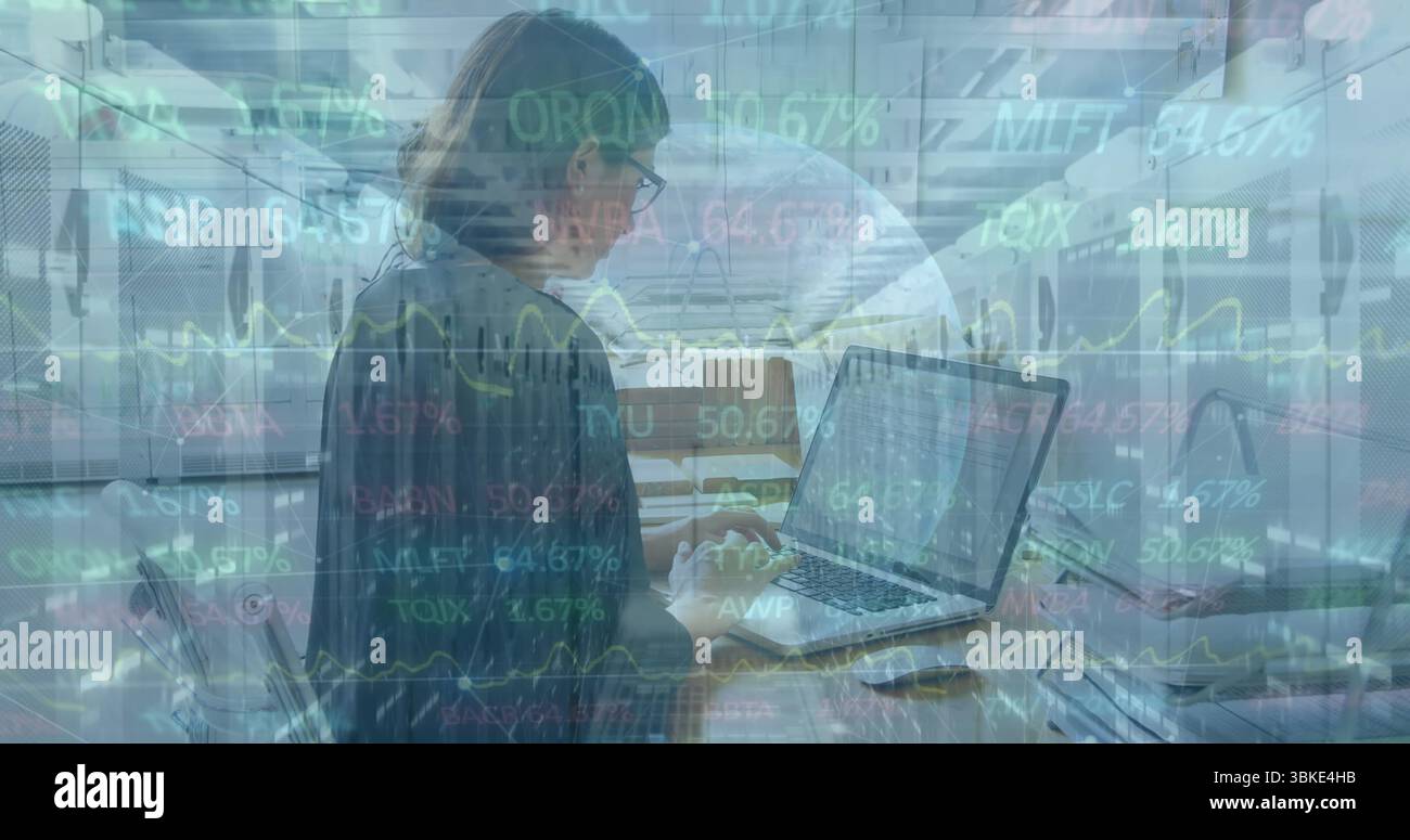 Woman reviewing data on laptop hi-res stock photography and images - Alamy