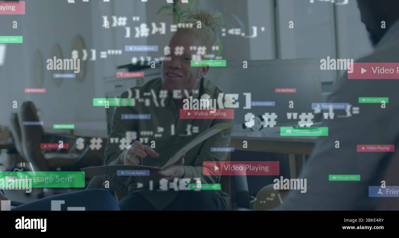 Presenting man in olive-green shirt explaining data on tablet at office ...