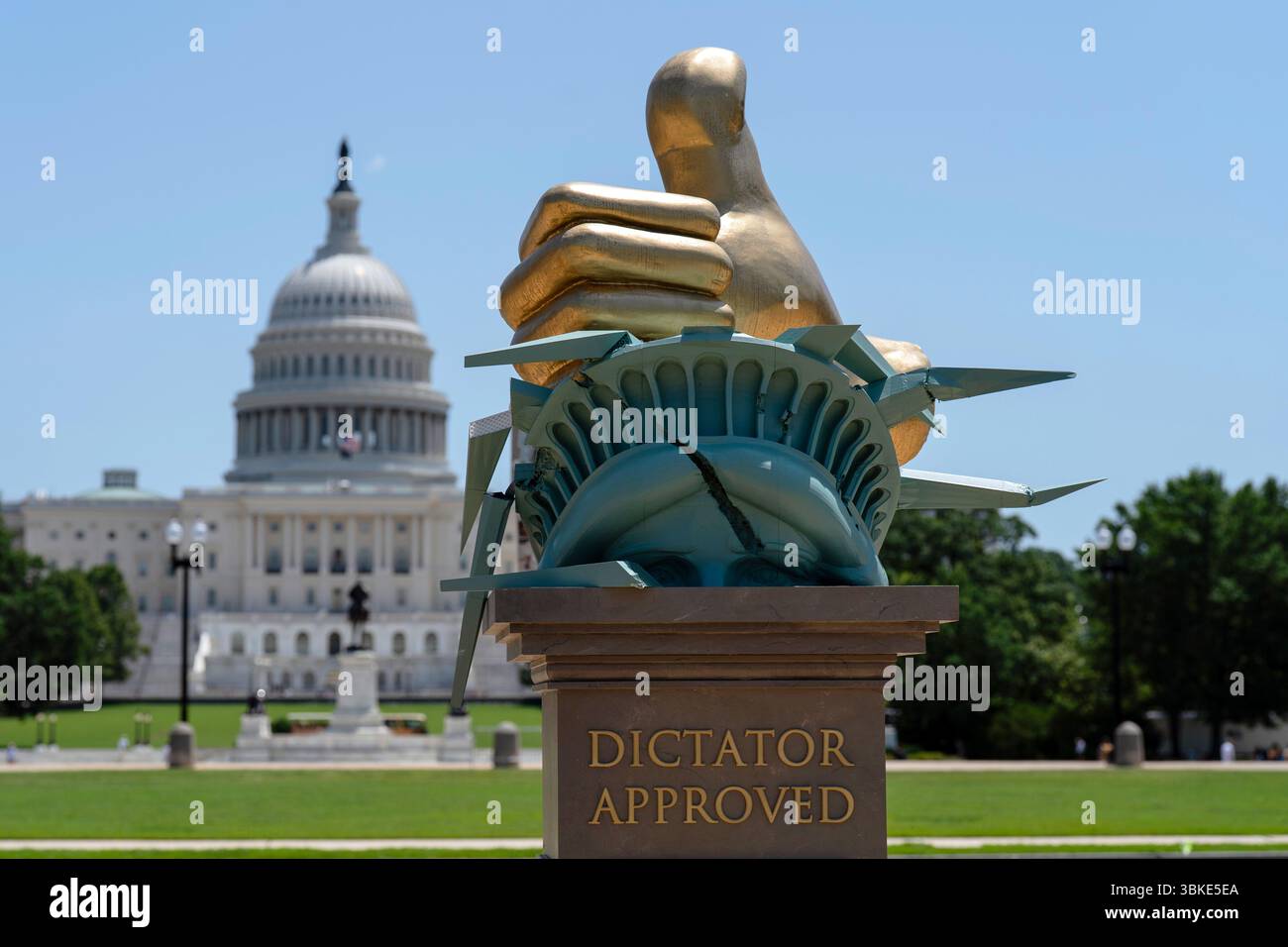 A temporary art installation titled "Dictator Approved" appears on the ...