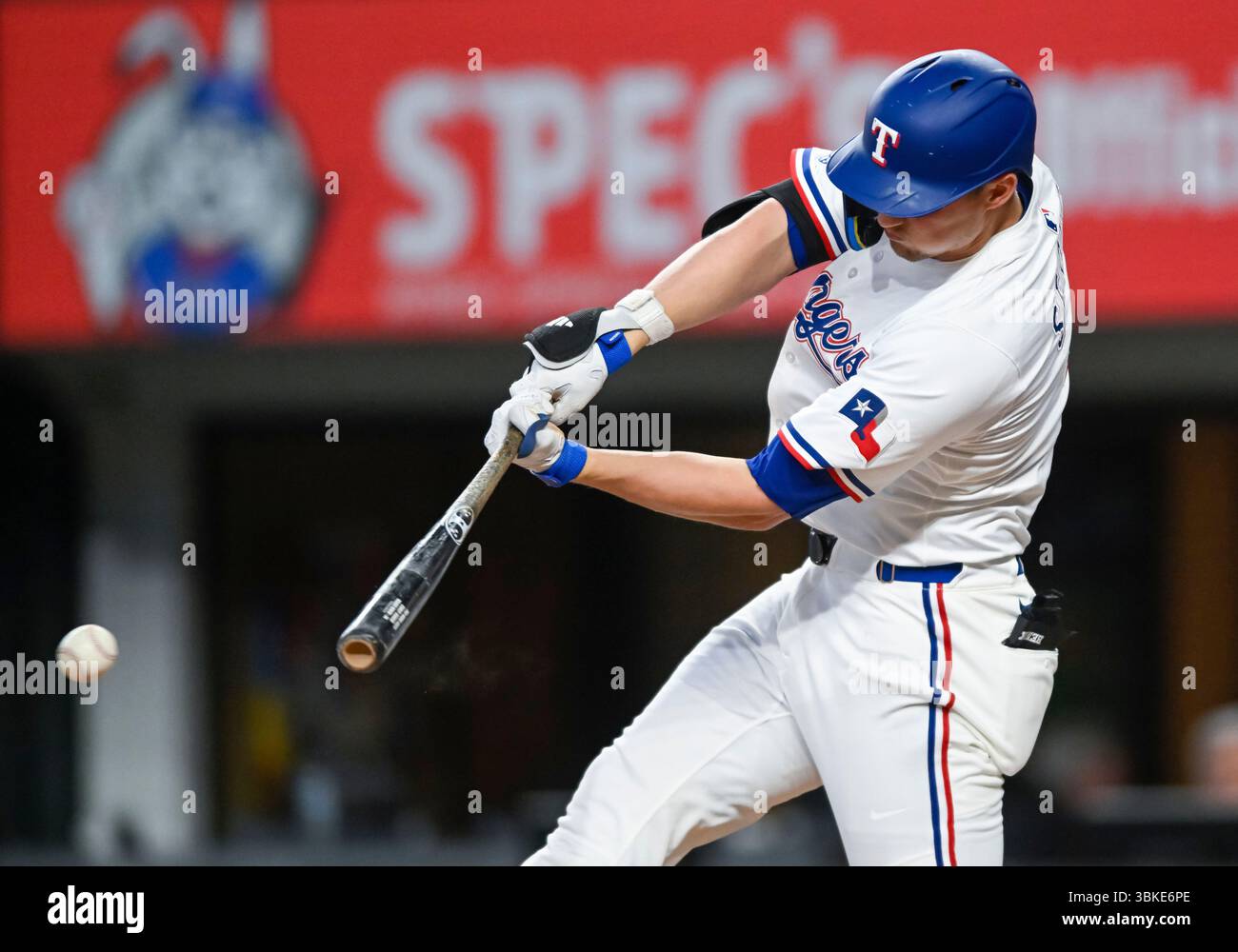 Texas Rangers' Corey Seager makes contact on a swing during a baseball ...