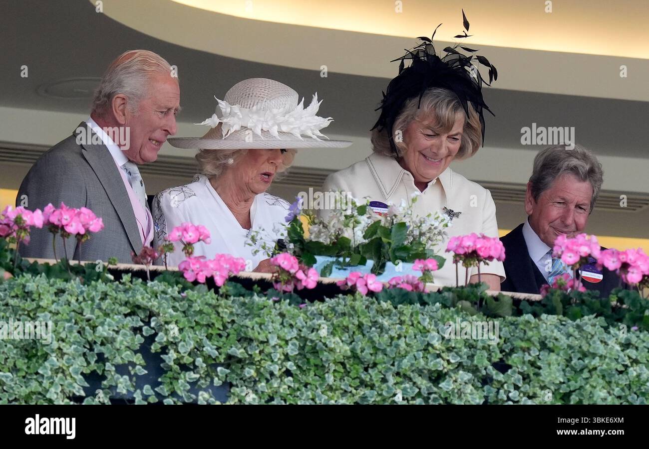 King Charles III (left) and Queen Camilla watching the Sandringham ...