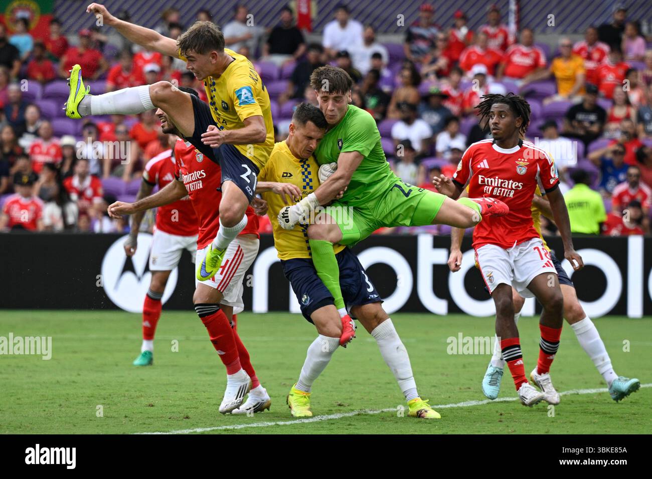 Auckland City's Adam Bell, left, Adam Mitchell, center, and Auckland ...