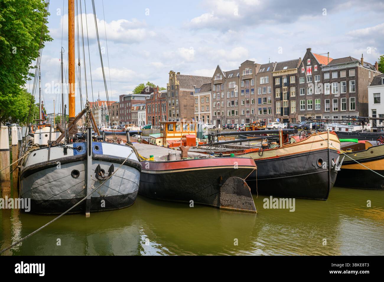 Antique Barges moored in the Wolwevershaven, Dordrecht, The Netherlands ...