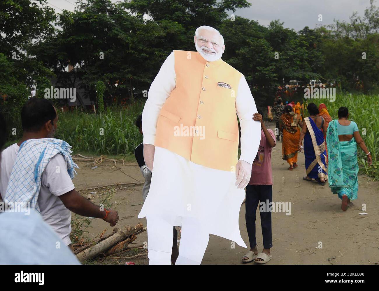 SIWAN, INDIA - JUNE 20: People carrying cutout of Prime Minister ...