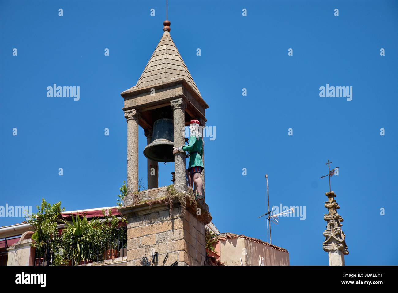 Character in traditional attire stands hi-res stock photography and ...