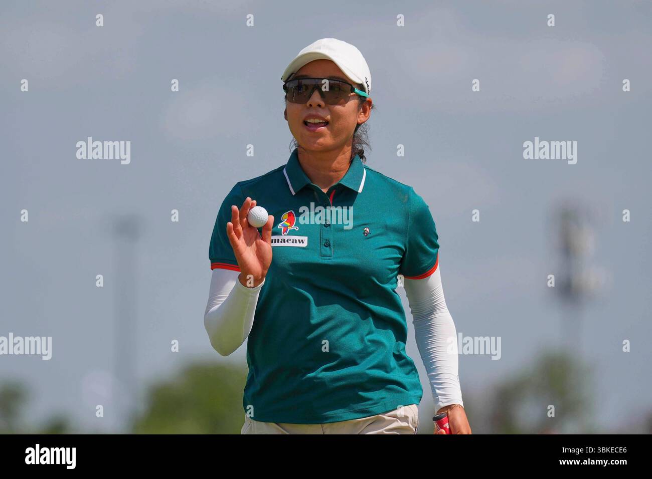 Mi Hyang Lee, of South Korea, waves after sinking her putt on the first ...
