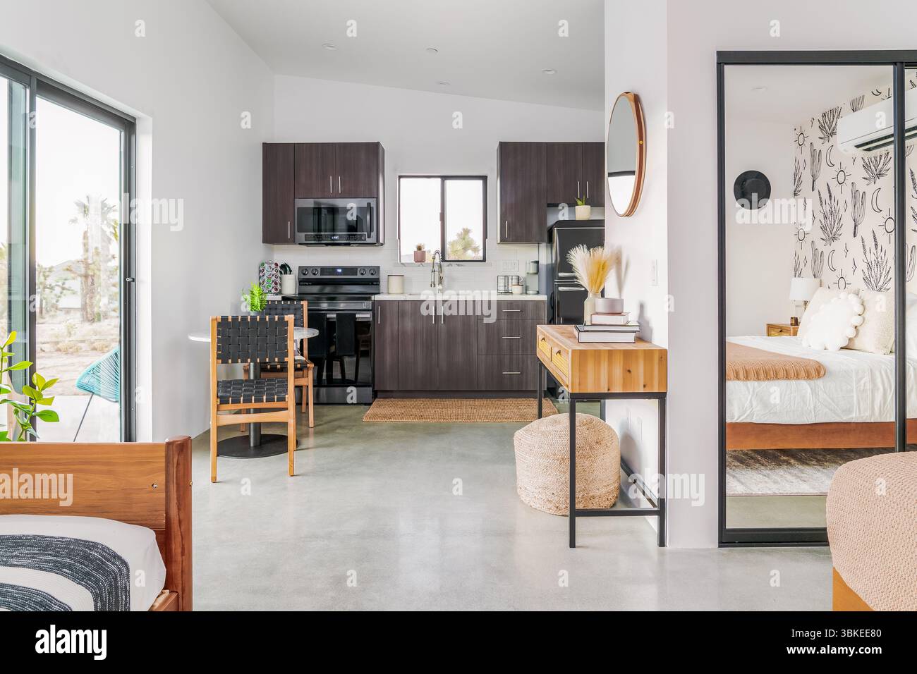 Modern desert studio apartment kitchen table chairs living room ...