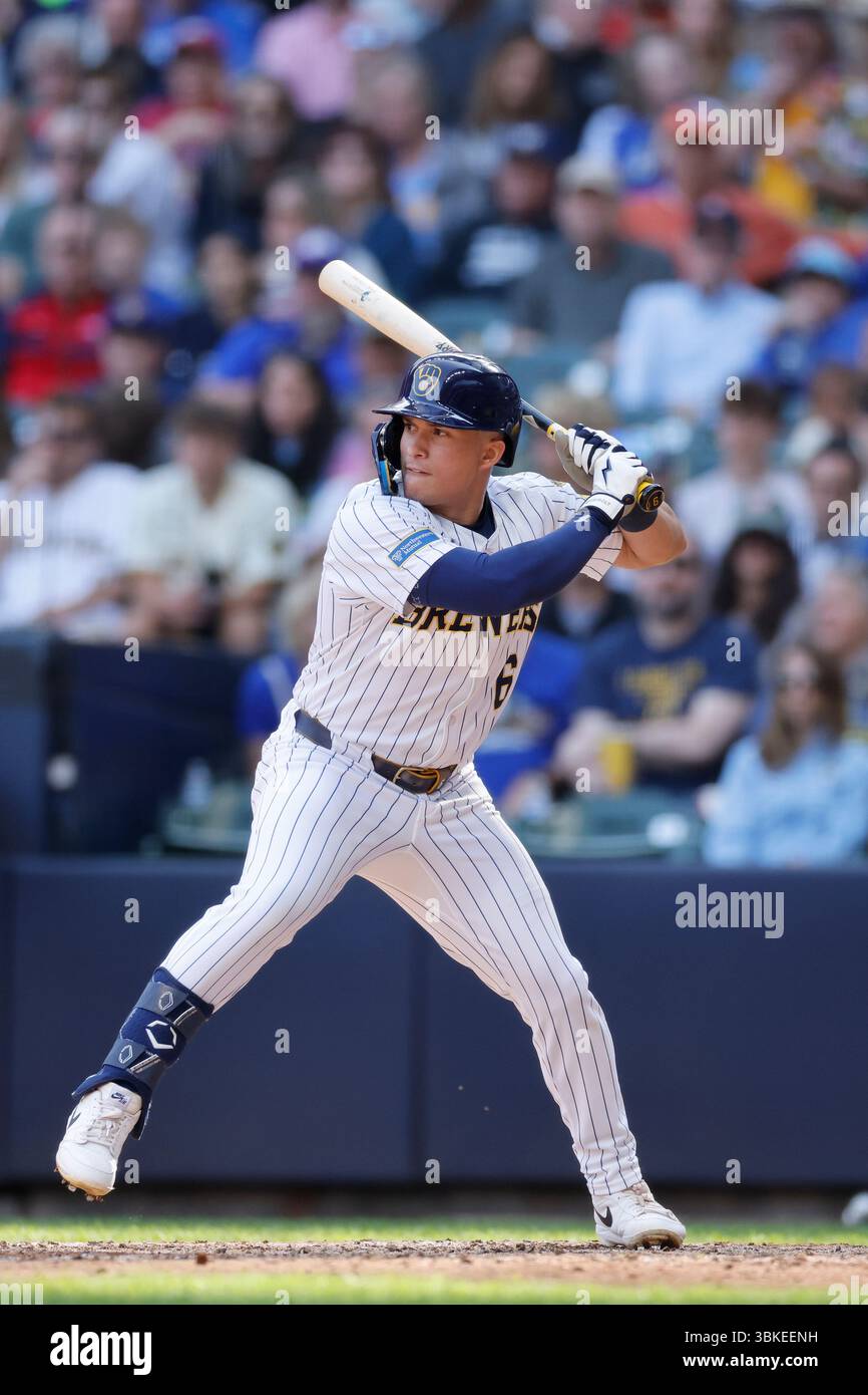 MILWAUKEE, WI - JUNE 14: Isaac Collins #6 of the Milwaukee Brewers bats ...