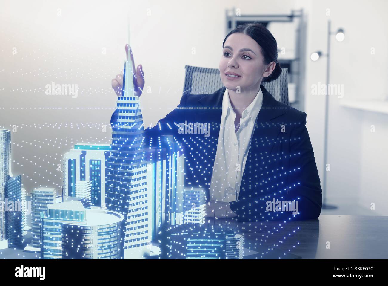 Building information modelling. Woman using holographic projection of ...