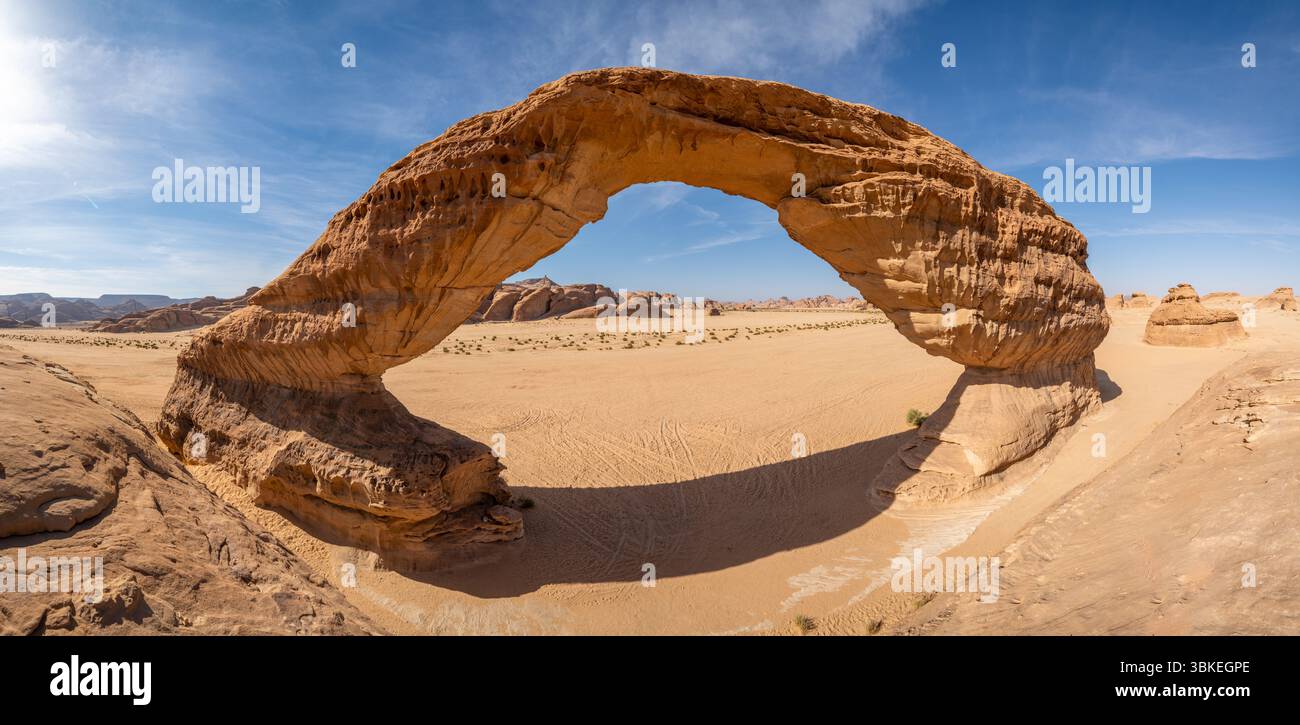 The panoramic desert landscape near AlUla, frames the amazing Rainbow ...