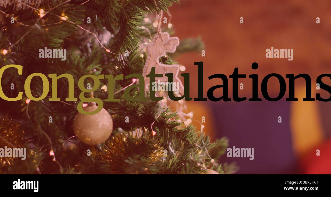 Showing branch glowing at home with lights, gold baubles, tinsel ...