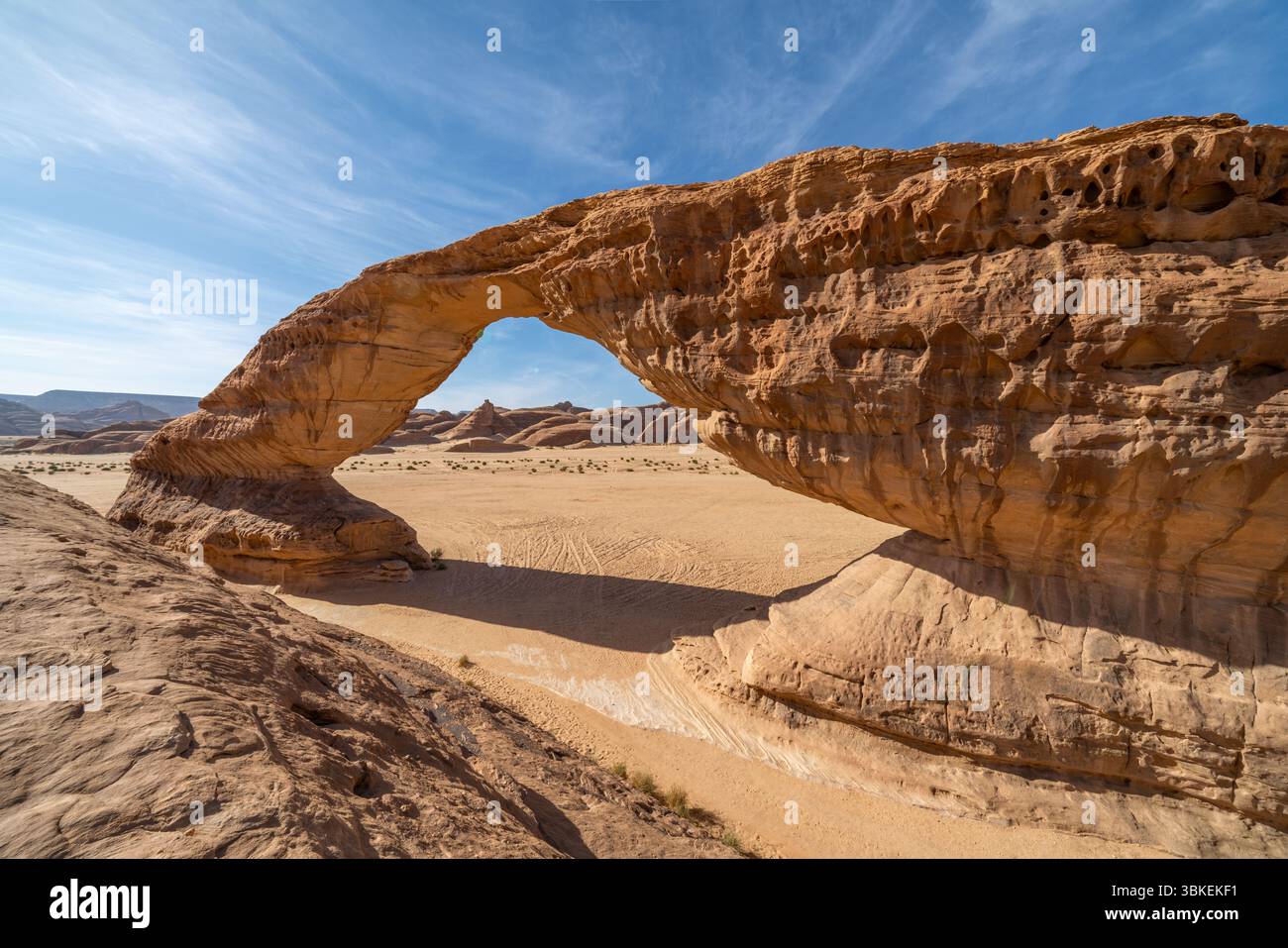 The panoramic desert landscape near AlUla, frames the amazing Rainbow ...