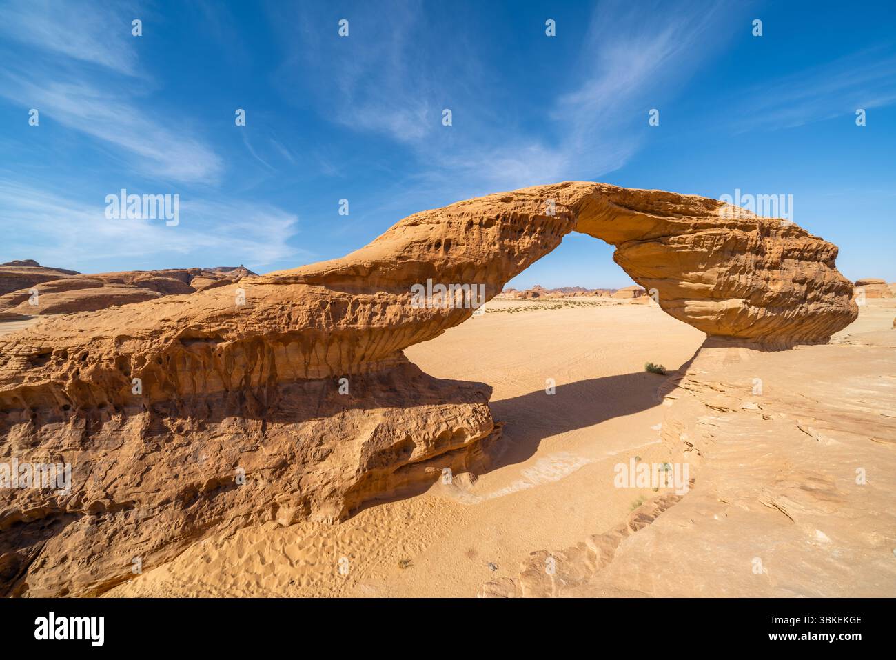 The panoramic desert landscape near AlUla, frames the amazing Rainbow ...