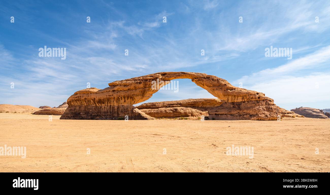The panoramic desert landscape near AlUla, frames the amazing Rainbow ...