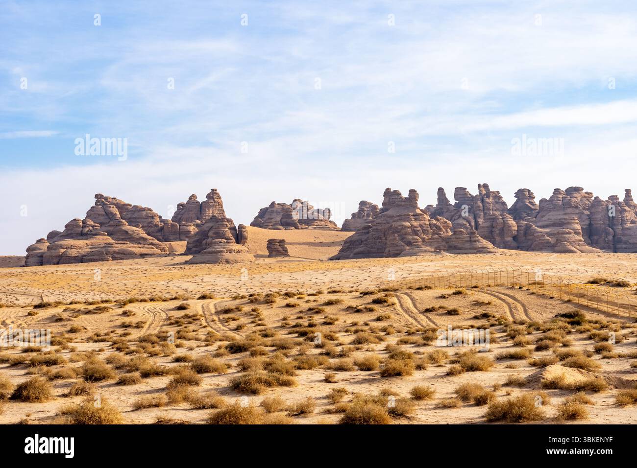 The scenic desert road between AlUla and Tabuk, Saudi Arabia, showcases ...