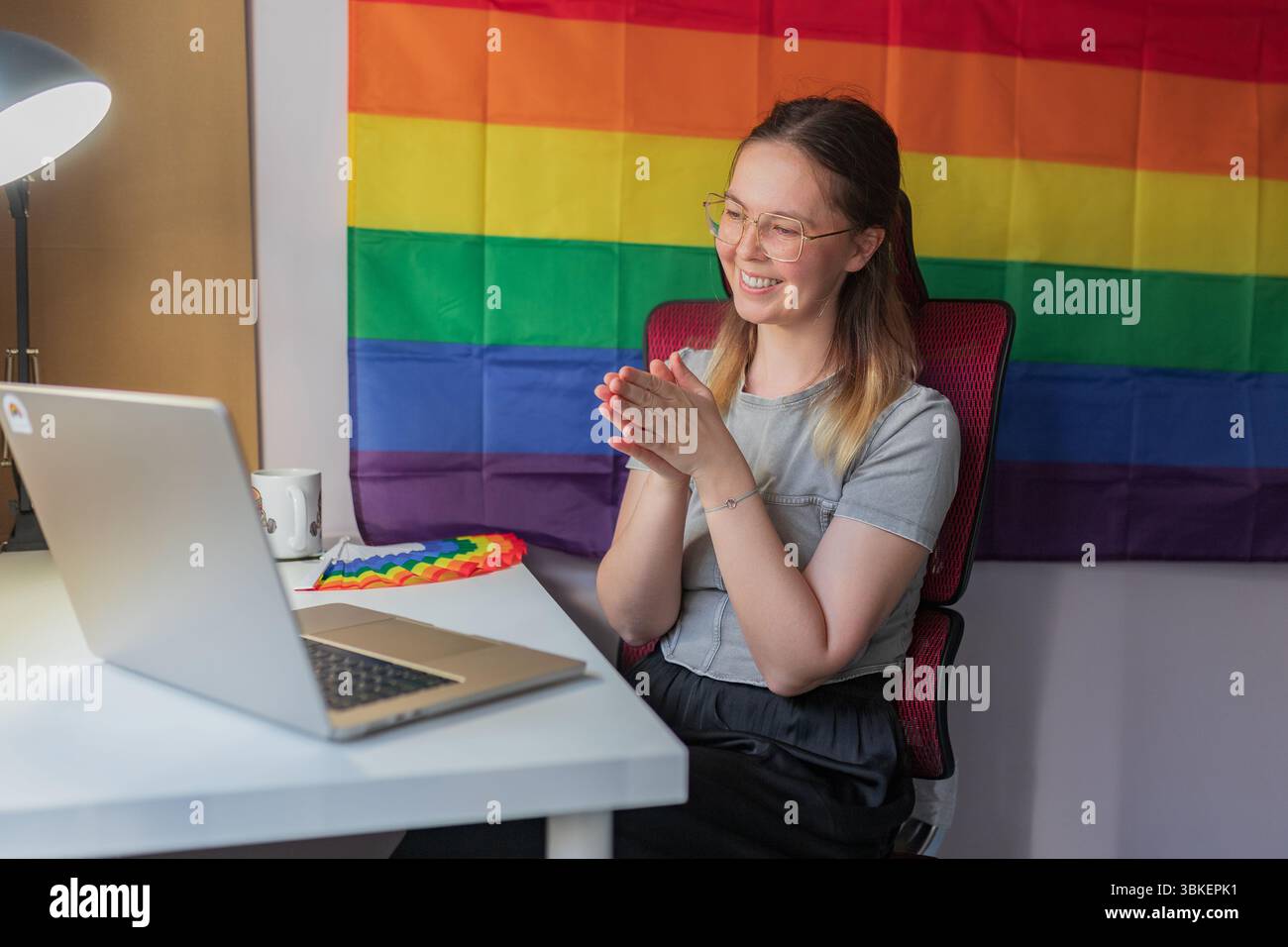 Woman claps hands smiling hi-res stock photography and images - Alamy