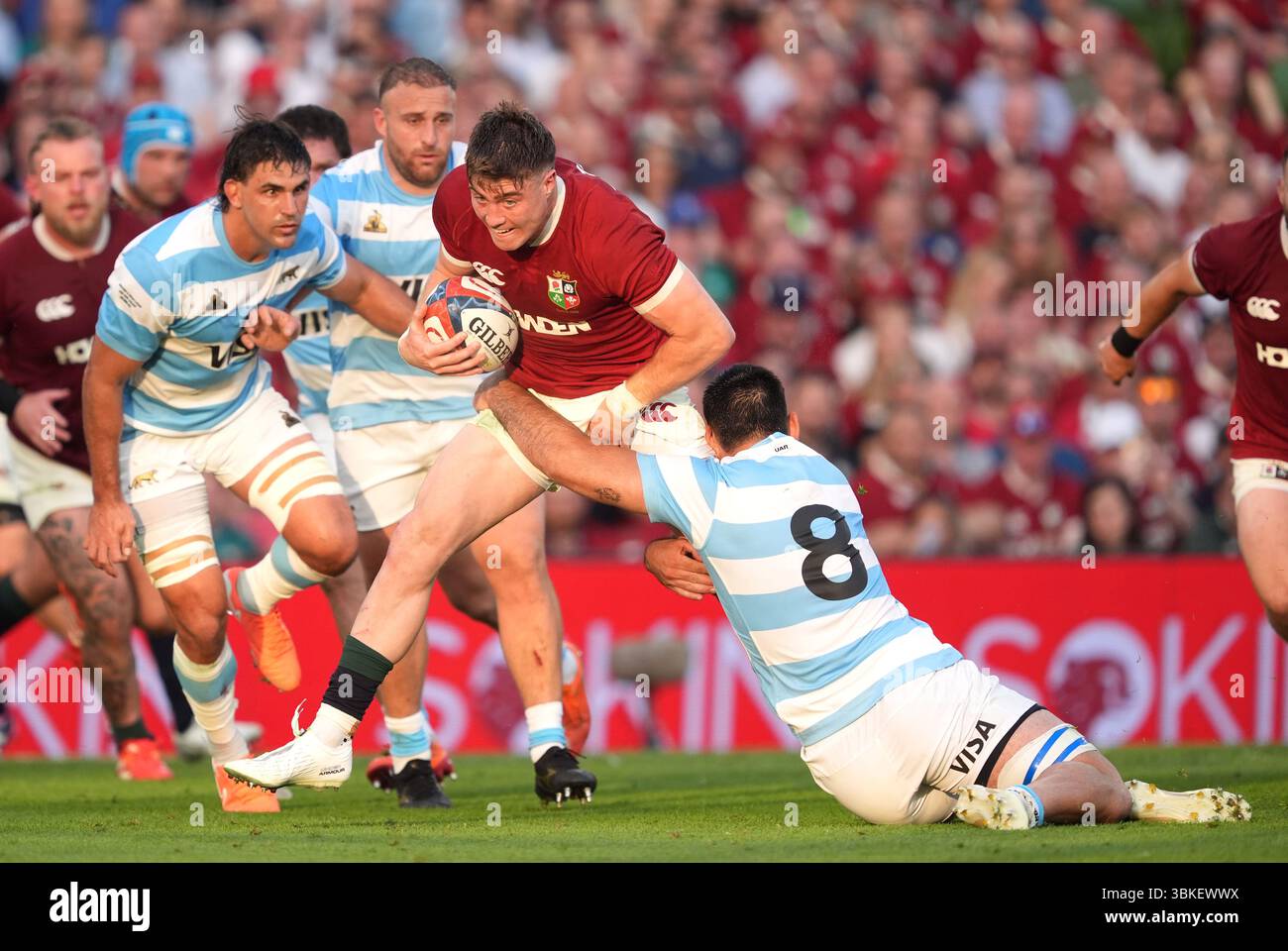 British and Irish Lions' Tommy Freeman tackled by Joaquin Oviedo during ...