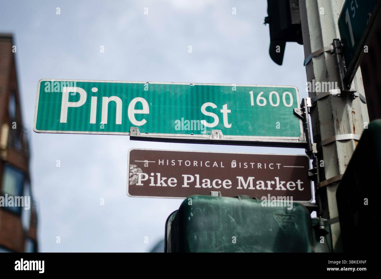 Street signs point to the historical district known as Pike Place ...