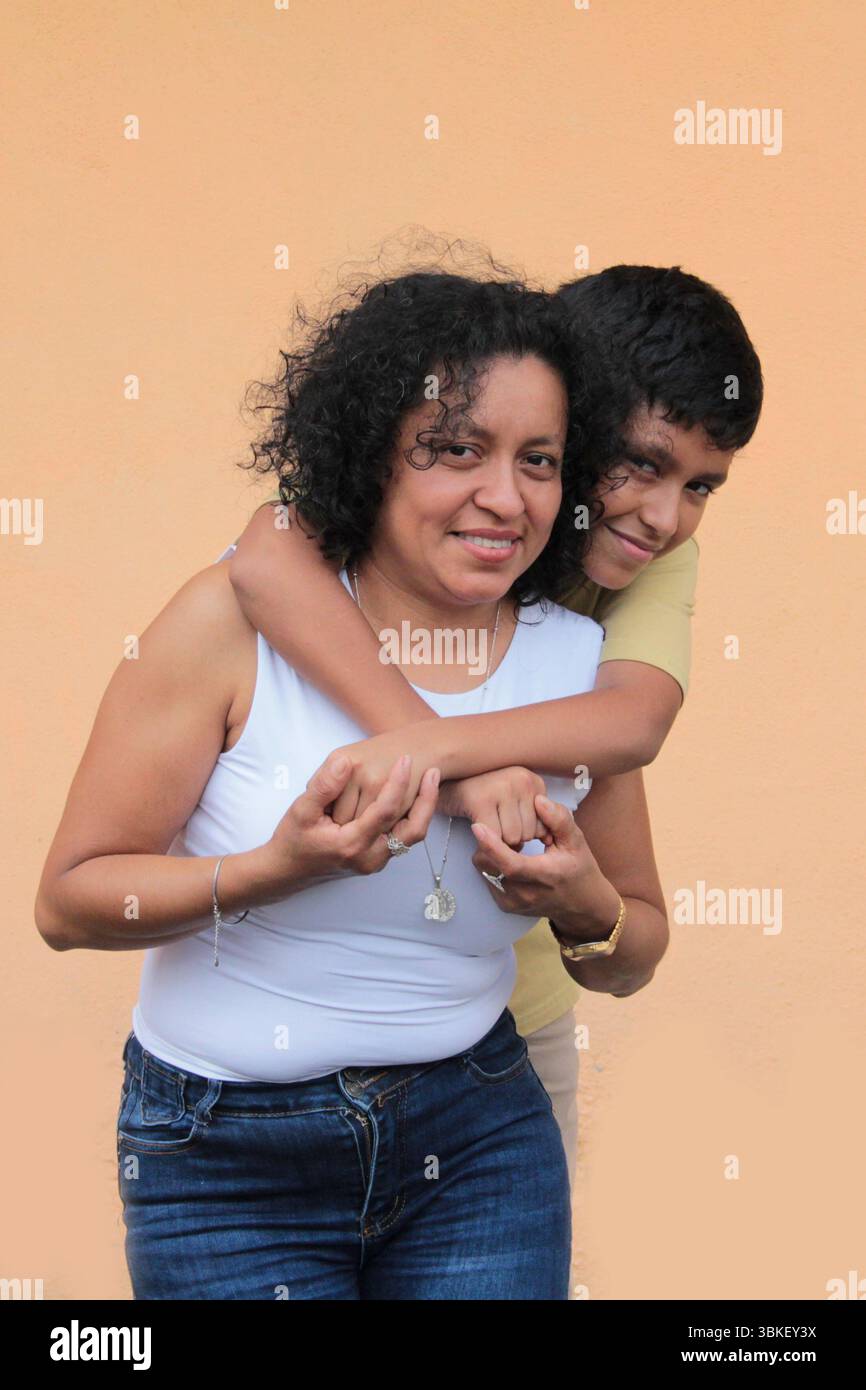A divorced single mother and her 9-year-old Latino son show their love ...