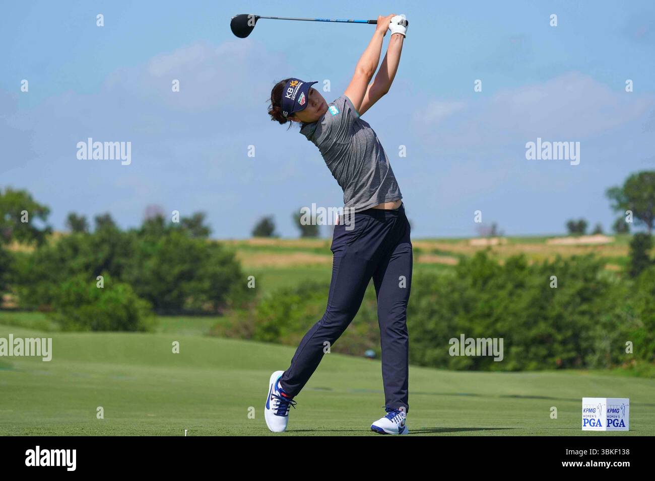 In Gee Chun, of South Korea, hits a tee shot on the sixth hole during ...
