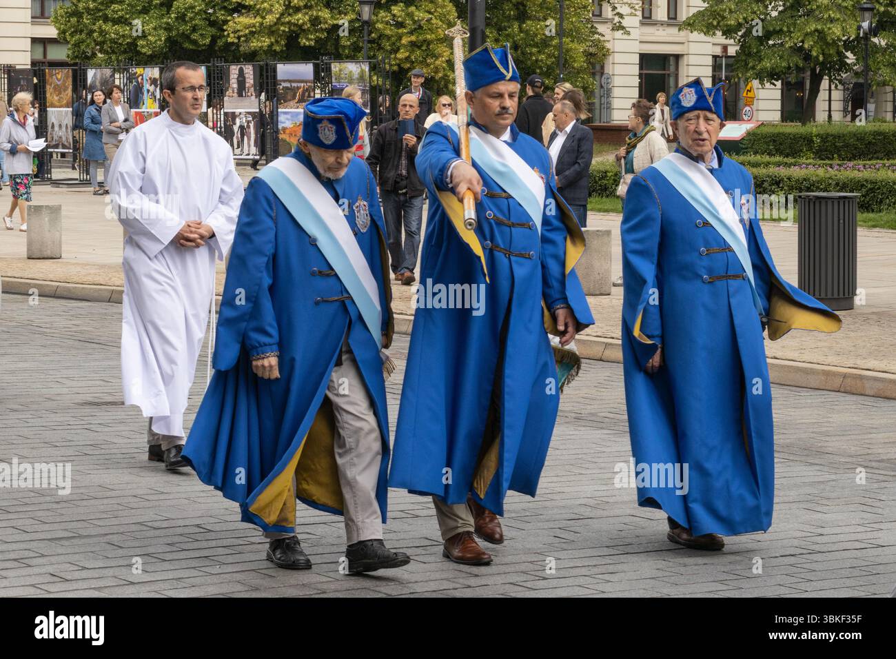 WHO: A group of Catholic clergy and lay participants wearing ...