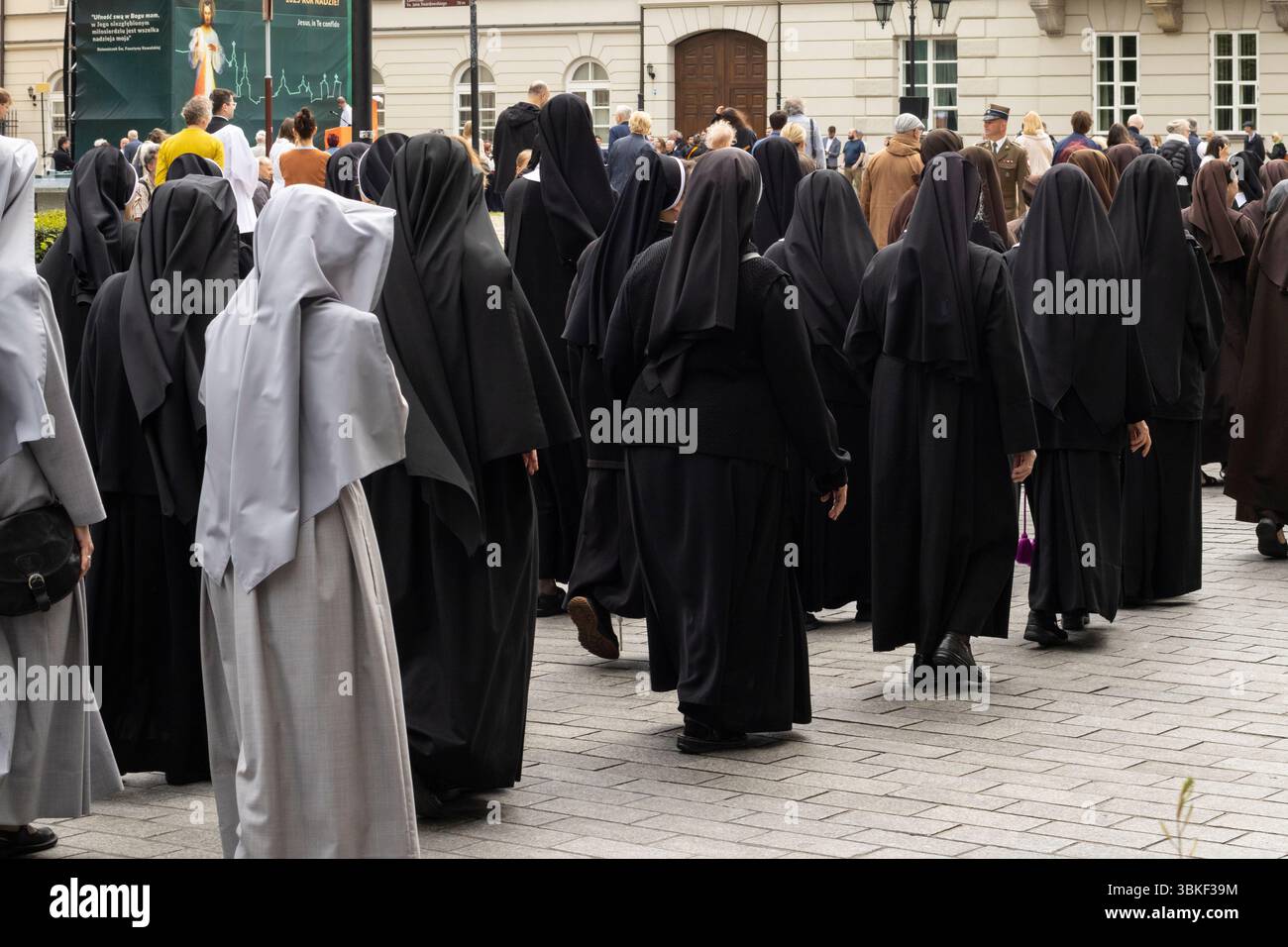 WHO: A group of Catholic nuns, clergy and lay parishioners participate ...