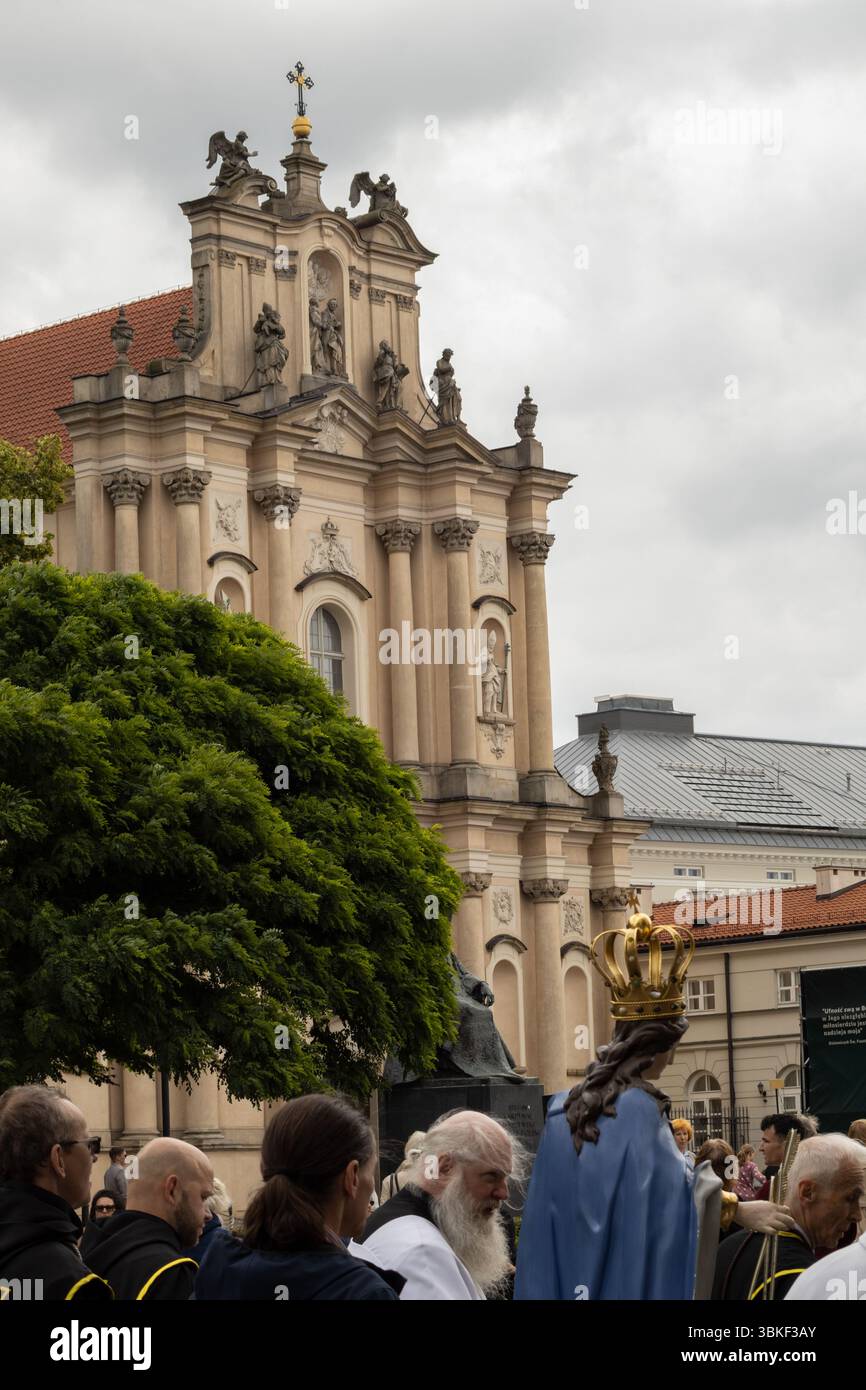 Catholic worshippers carry a statue of the Blessed Virgin Mary and the ...