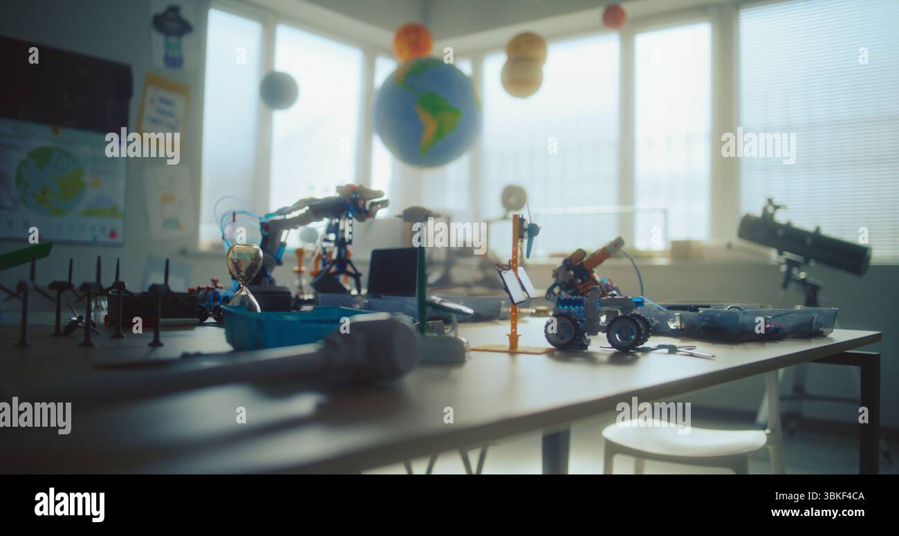Modern Science Classroom with Hanging Solar System Models, 3D Printers ...