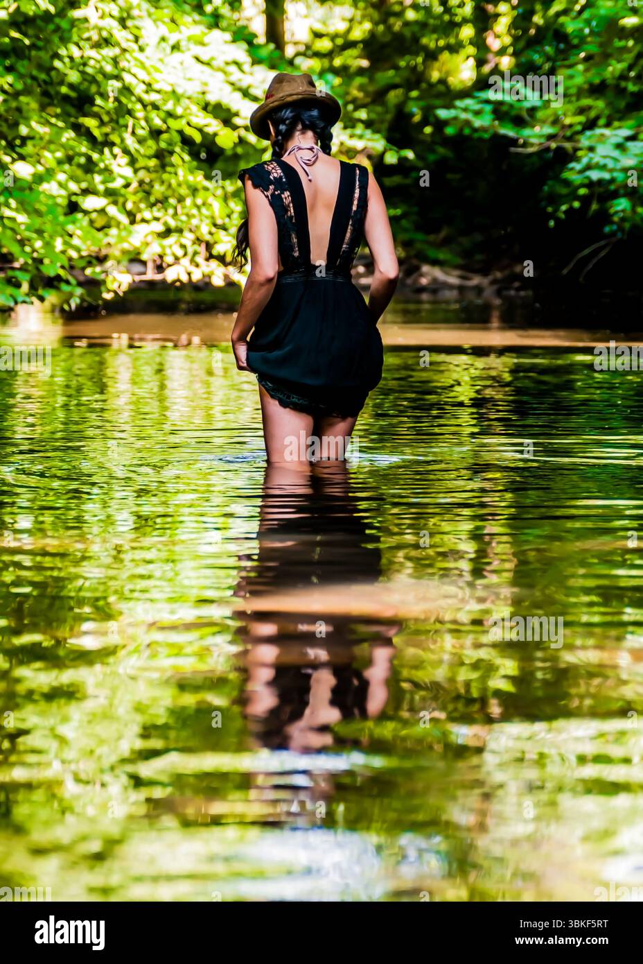 Woman long flowing hair walks hi-res stock photography and images - Alamy