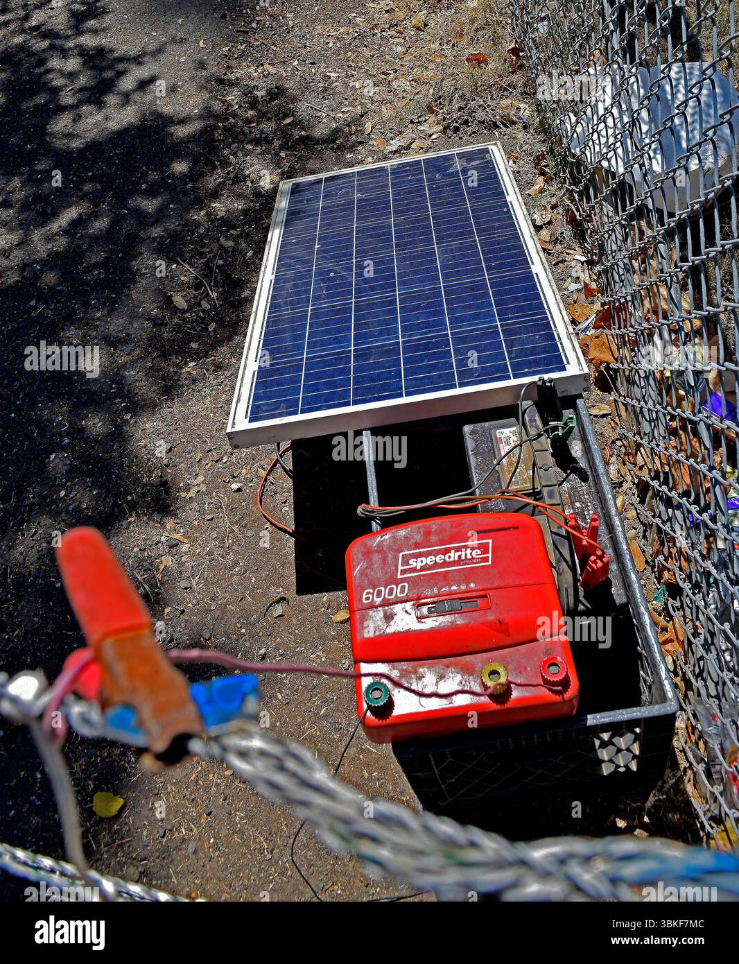 solar panel and Speedrite 6000 electric fence controller connected to a ...