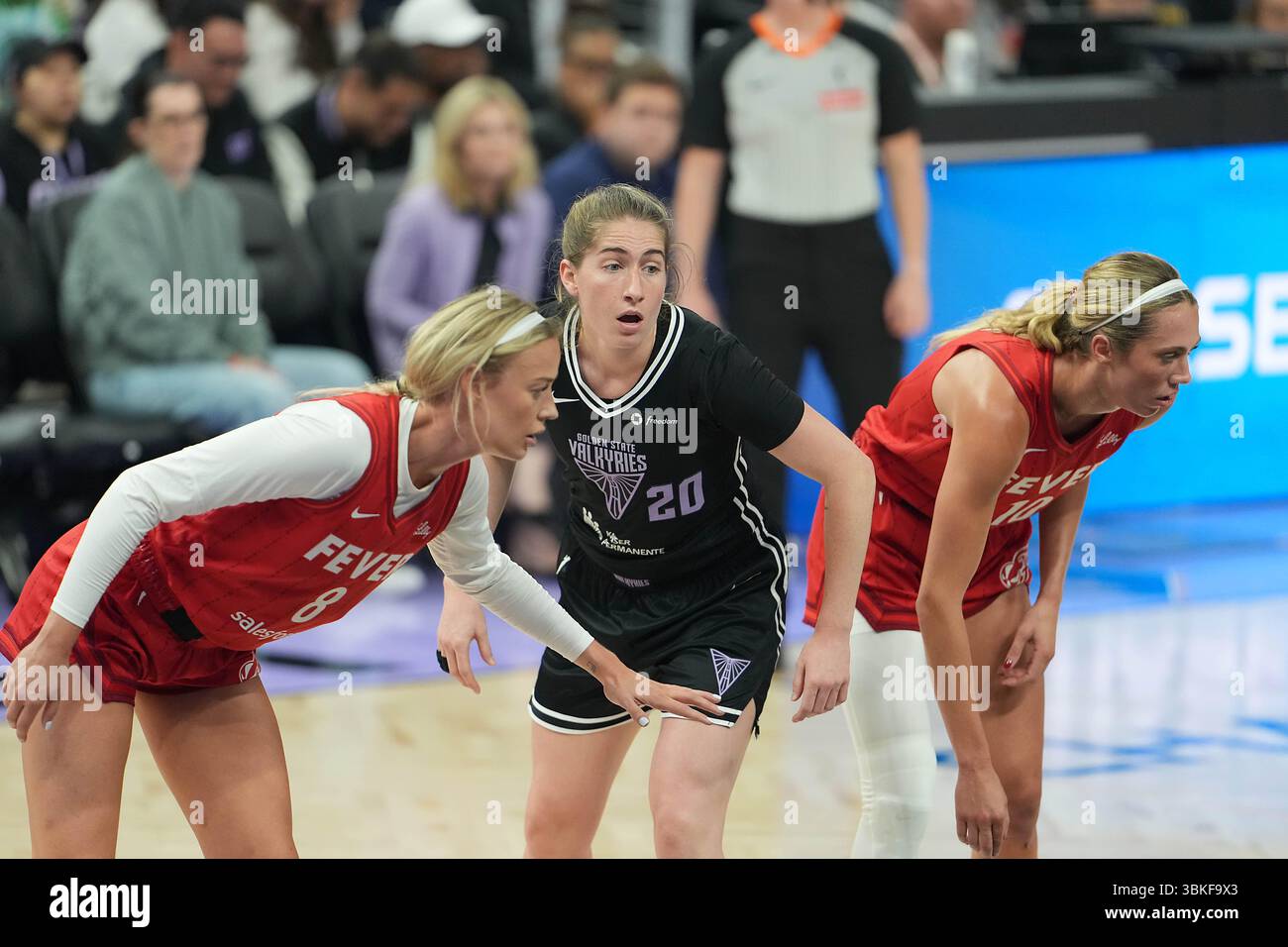 Golden State Valkyries guard Kate Martin (20) between Indiana Fever ...