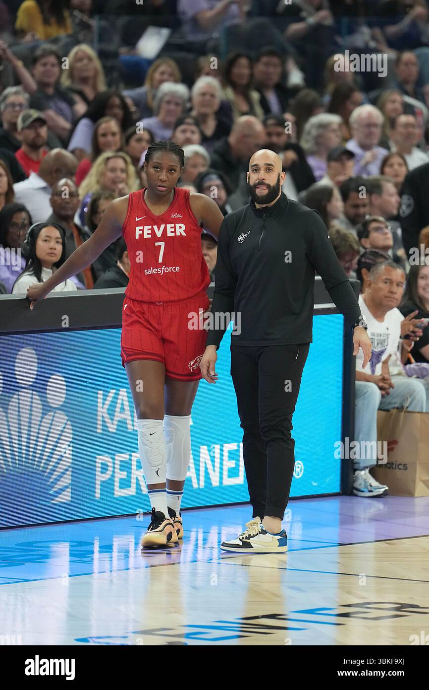 Indiana Fever forward Aliyah Boston (7) talking with coach Austin Kelly ...