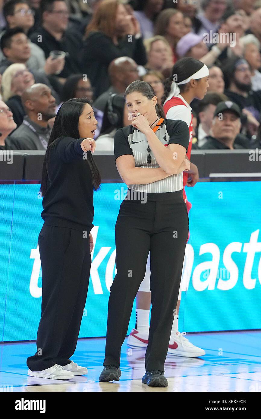 Golden State Valkyries head coach Natalie Natase talking with crew ...