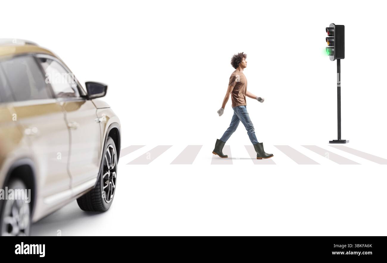 Man in rubber boots crossing at a pedestrian zebra isolated on white ...
