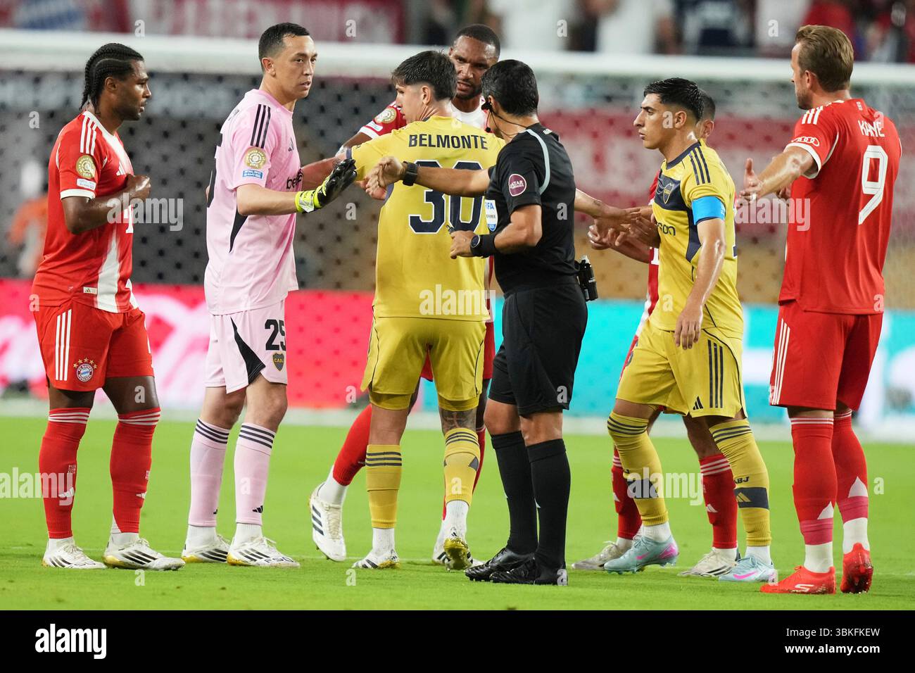 Referee Alireza Faghani gestures to players after a goal was disallowed ...