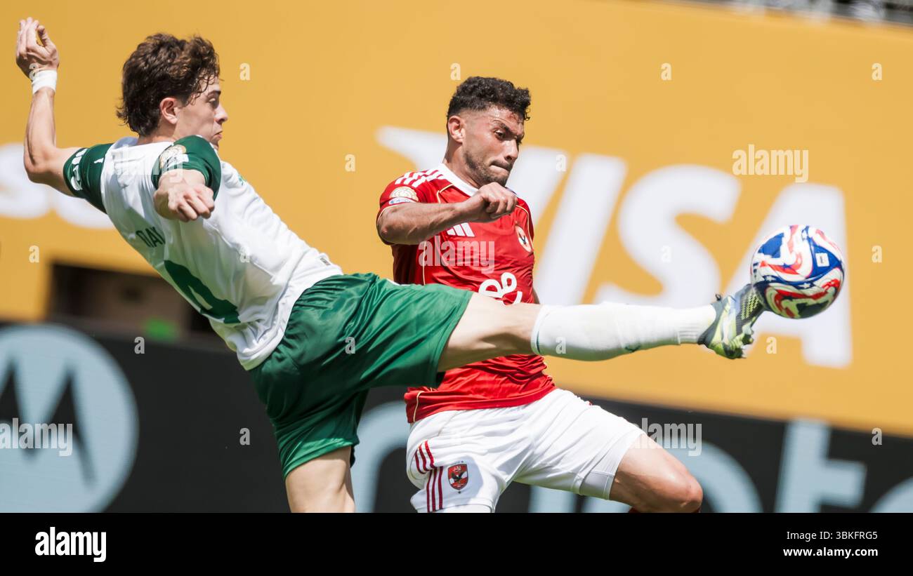 Agustin Giay of SE Palmeiras competes for the ball with Yasser Ibrahim ...