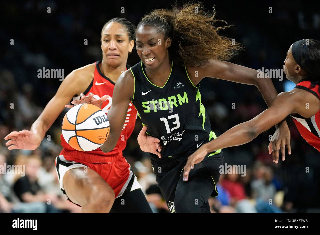 Seattle Storm forward Ezi Magbegor (13) drives against Las Vegas Aces ...