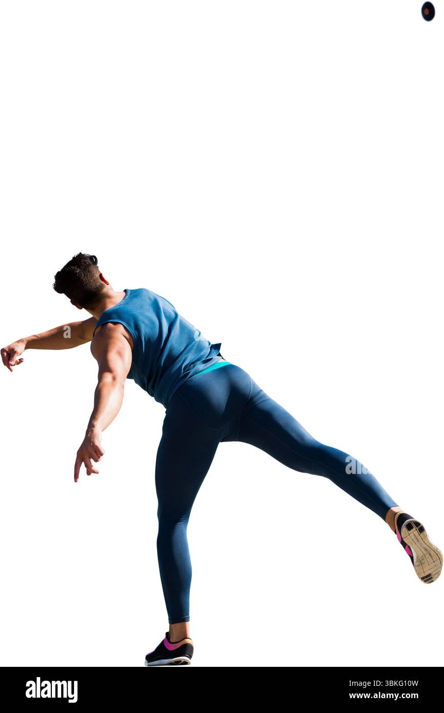 Man throwing discus against white background Stock Photo - Alamy